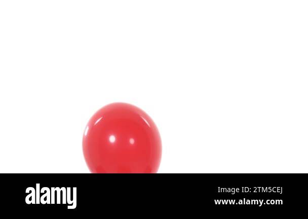 Close-up demonstration video of a red balloon flying up and ...