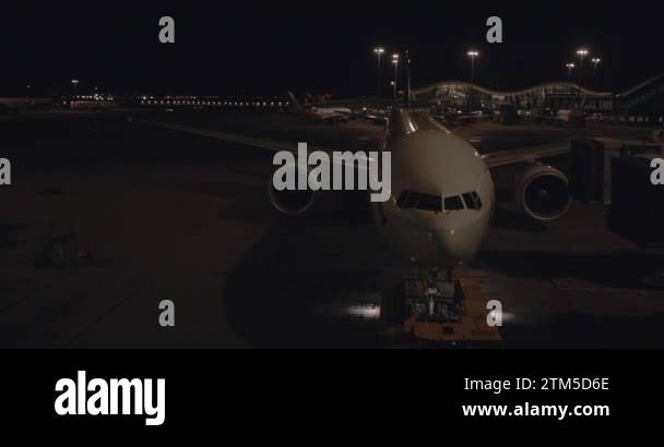 Plane Through The Terminal Window At Hong Kong Airport At Night Stock ...