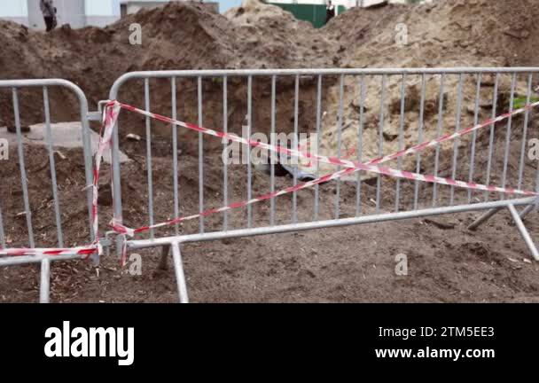 Earthworks, digging trenches. an earthen pit dug for laying pipe or ... Earthworks, digging trenches. an earthen pit dug for laying pipe or ...