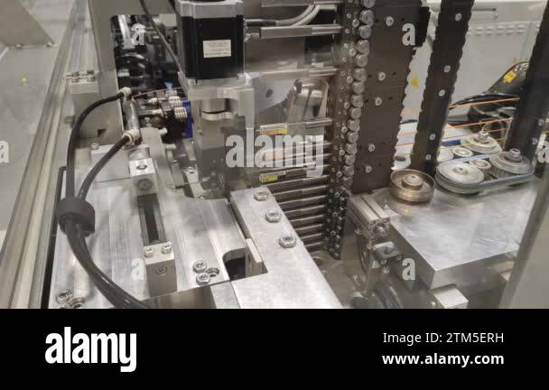 wire cutting machine. Automated automotive production. robotic process ...