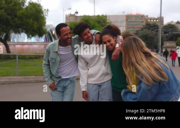 United group of college student friends having fun at city street ...