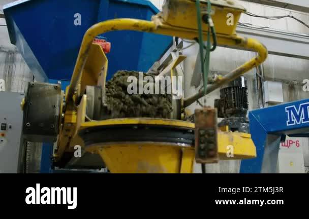 Cement making plant. The working process of making cement rings for ...