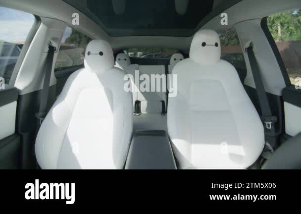 Empty Tesla Model Y car self driving using autopilot technology on ...