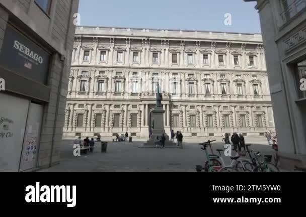 Europe, Italy, Milan 2023 - tourists and crowds of people visit the city downtown - take a ...