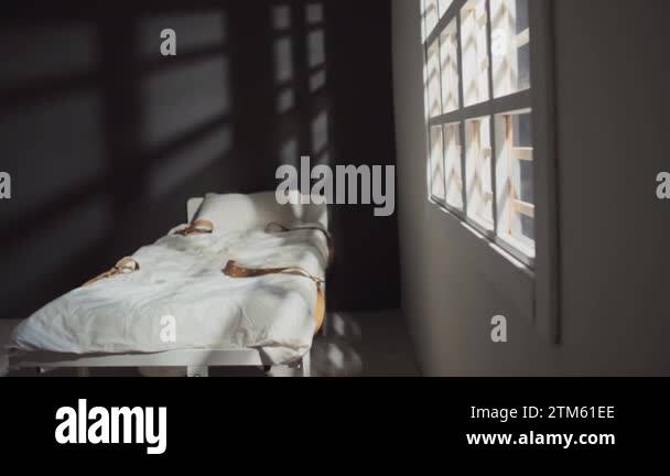 No people interior shot of ward in psychiatric hospital with bed ...