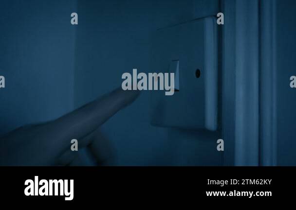 Turning Light On Or Off In Dark House Stock Video Footage - Alamy