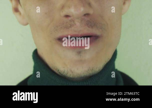 Man pronounce words in front camera. Mouth. Teeth. Smile. Bristle. Show ...