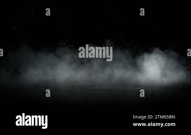 Super Slow Motion Shot of Atmospheric Smoke Slowly Floating on Black ...