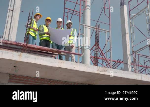 Team group of contractor and architect with foreman explaining about ...