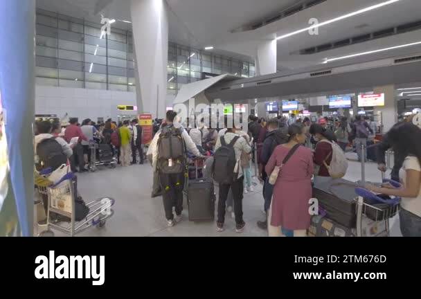 Delhi, India, April 2023: Huge crowd in front of VietJet airline check ...