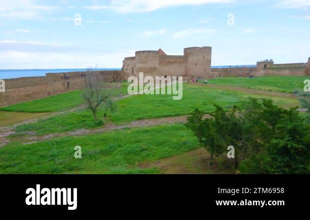Preserved medieval stone Citadel of the Akkerman Fortress and the green ...