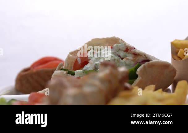 Greek souvlaki gyros Stock Videos & Footage - HD and 4K Video Clips - Alamy