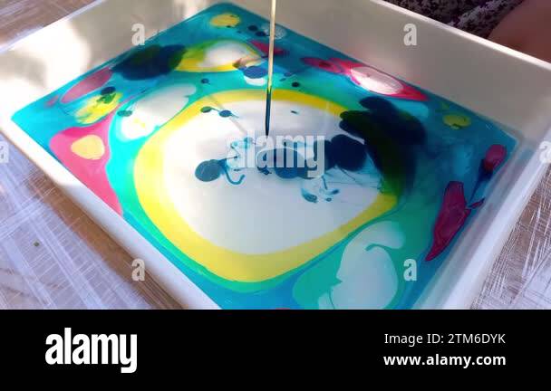 Lesson on drawing technique Ebru. child drawing, mixing paints ...