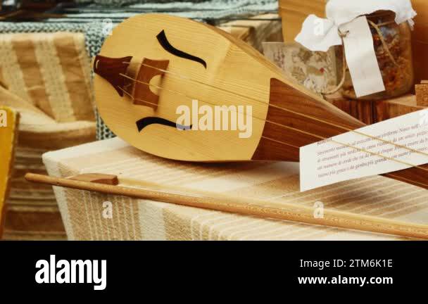 medieval reenactment - close-up shot medieval wooden lute and other ...