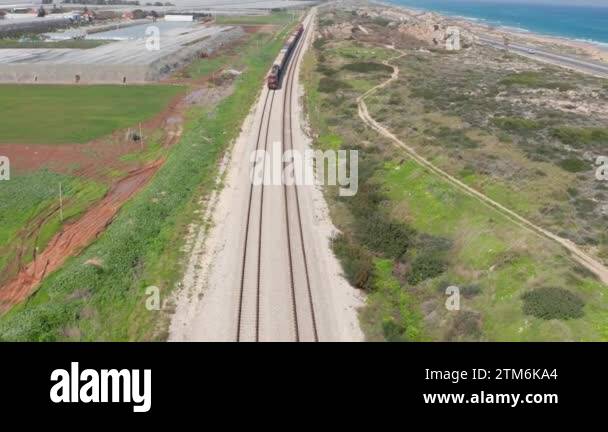 cargo containers on the railroad. Intermodal container in a train ...