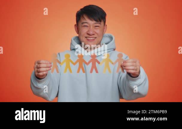 Man showing multiracial different skin color human shape cut out of ...