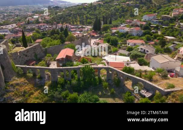 This aerial stock video captures the stunning ruins of the Old Bar or ...