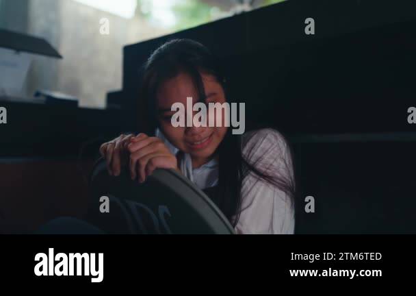 a woman who was crying under the table because of being bullied by her ...