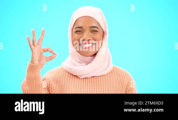 Muslim woman, ok sign and smile on face with hand for emoji, icon or ...