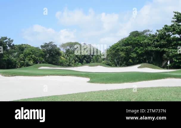 The beauty of a golf course in lush, tropical Mexico in HD footage ...