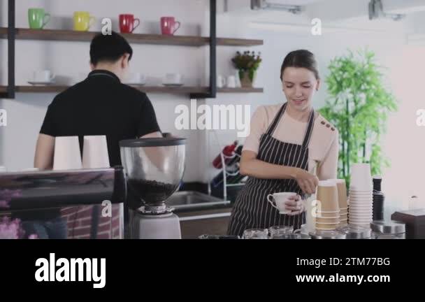 Coffee shop concept of 4k Resolution. employees working together in a ...