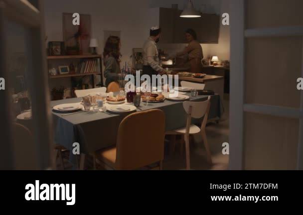 Full shot of Jewish family of three, mother, father and teenage ...
