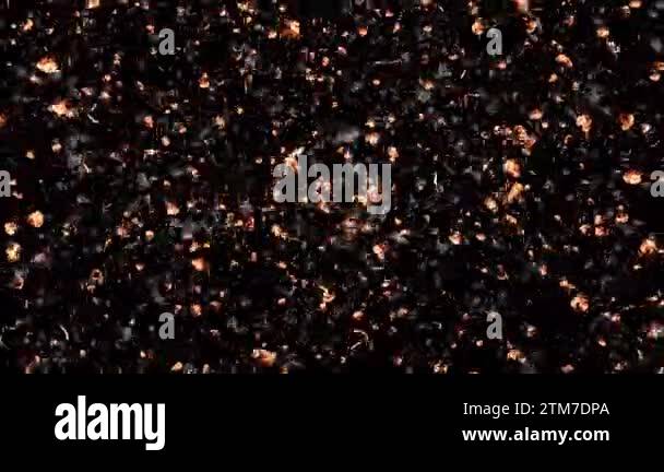 Fire burn ash or dust particles, flying and floating on air in a loop ...