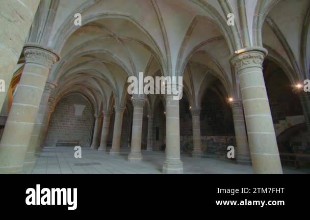 The camera moves inside the church, which is located on top of the Mont ...