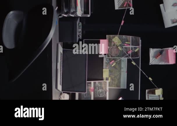 Vertical video: Evidence board with case files or investigation clues ...
