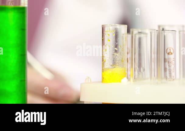 Gloved hand holding test Stock Videos & Footage - HD and 4K Video Clips ...