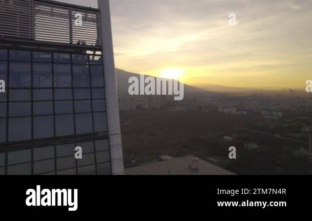 soaring birds eye view of a modern high-rise office building in Sofia ...