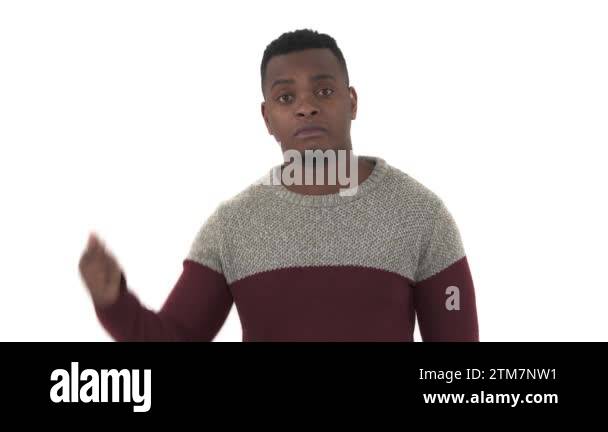 Disappointed man expressing negative emotions by showing index finger ...