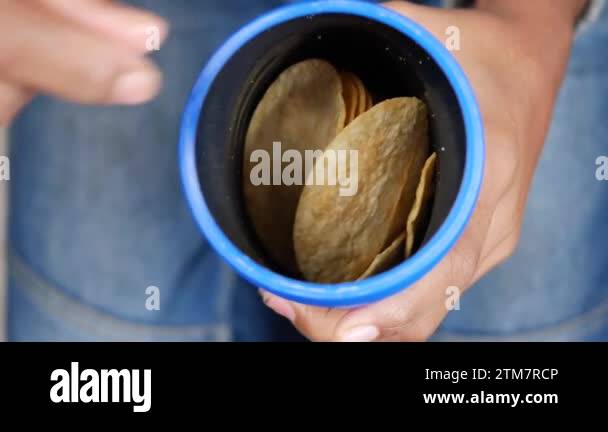Hand pick chips from container Stock Videos & Footage - HD and 4K Video ...