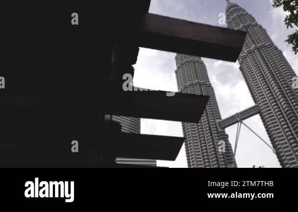 KLCC twin towers and tall buildings in Malaysia - view from ground ...