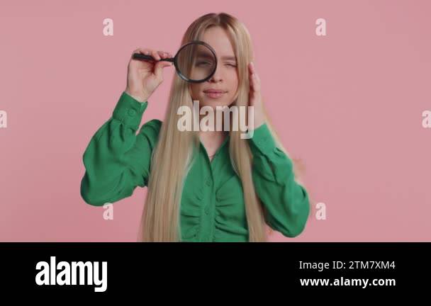 Investigator researcher scientist woman holding magnifying glass near ...