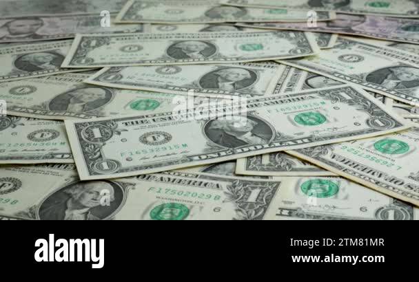 American one dollar paper money pile on desk. US Dollar bills one ...