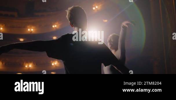 Man and woman dance and practice ballet lifts during choreography ...
