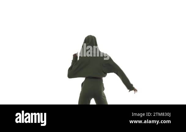 Back view of African young woman in hood dancing, rhythmically moving ...