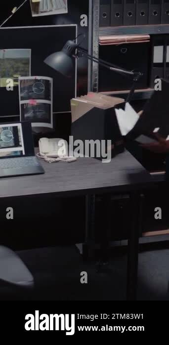 Vertical video: Private agency detective conducting investigation with ...