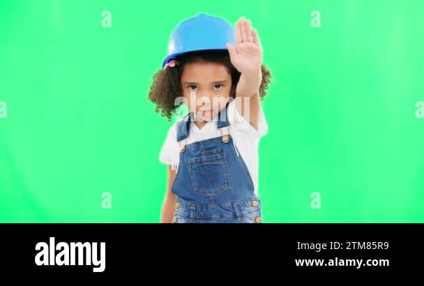 Stop, builder and face of a child on green screen isolated on a studio ...
