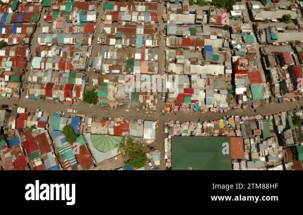 Poor area in the slums of Manila with density houses and streets from ...