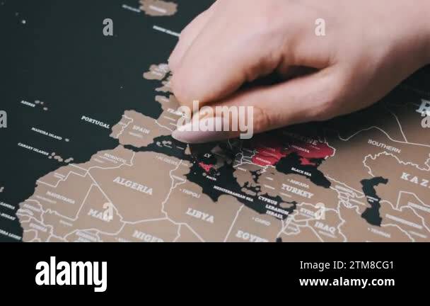 Female Hand Scratching country of Italy on the Surface of Scratch World ...