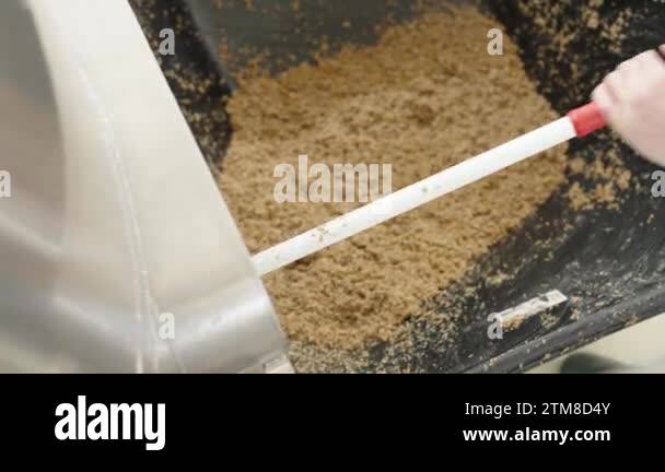 cleaning the boiler from residual malt after brewing beer in the ...