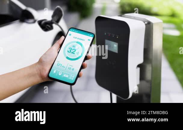 Smartphone display battery status on smart EV mobile application while ...