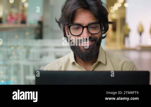 Portrait smiling happy business owner Indian Arabian man Muslim worker ...
