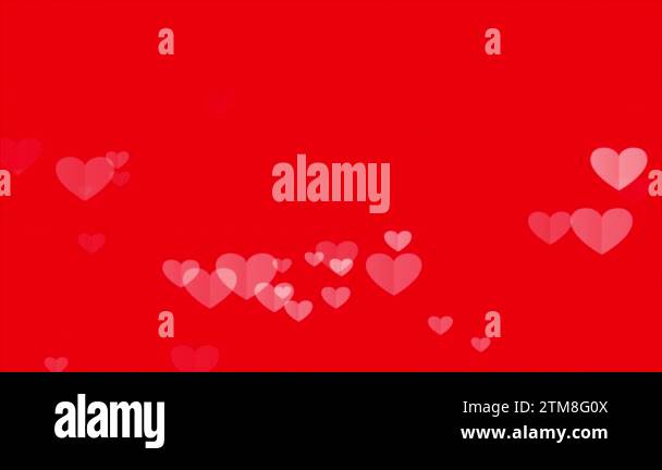 Loop glow hearts particles flow up motion on red abstract background for Valentine's day ...