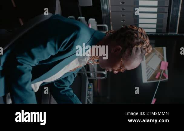 Vertical Video African American Woman Working In Police Archive Space