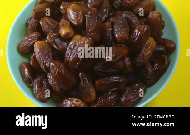 Dates. Dried date palm fruits. Healthy sweet snack food bowl. Pile of ...