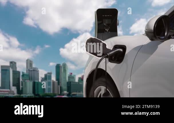 Electric vehicle, EV car recharges battery energy at charging station ...