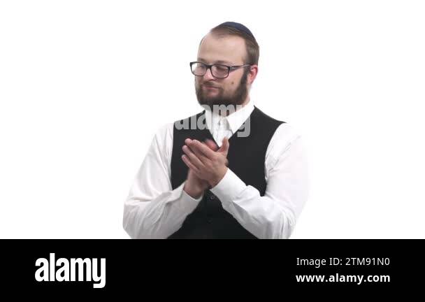 Young Jewish man clapping and applauding in sarcastic manner. Emotions ...